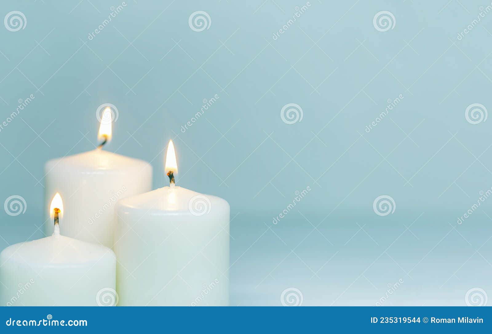 Panorama of Three White Candles Burning on White Gradient Background ...