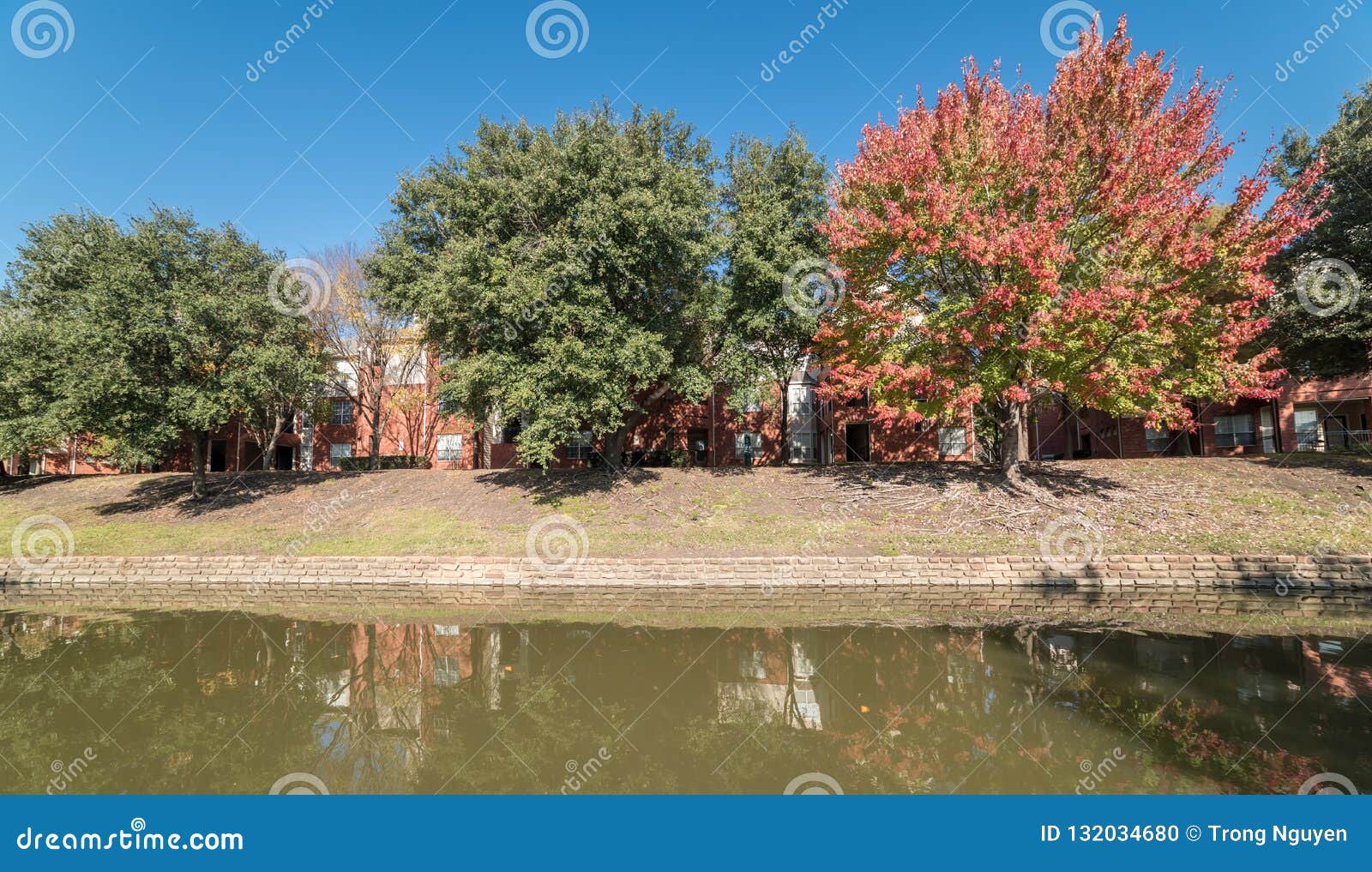 Panoramic Multi-story Riverside Apartment Complex Fall Foliage I Stock ...