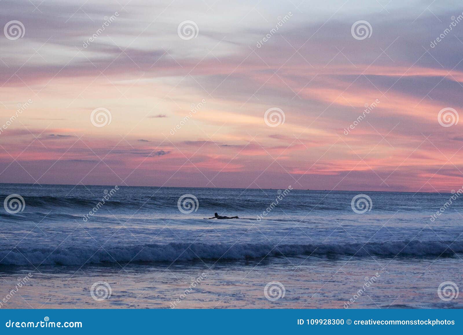 Panoramic Photography Of Surfing Man At Sunset Picture. Image: 109928300