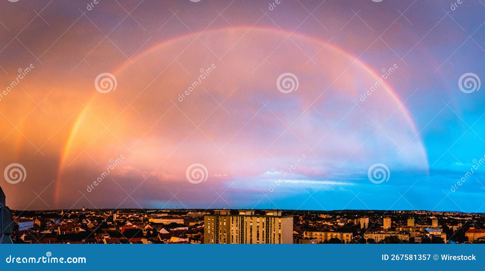 Panoramic Shot of the Double Sided Rainbow at Sunset Over the City ...