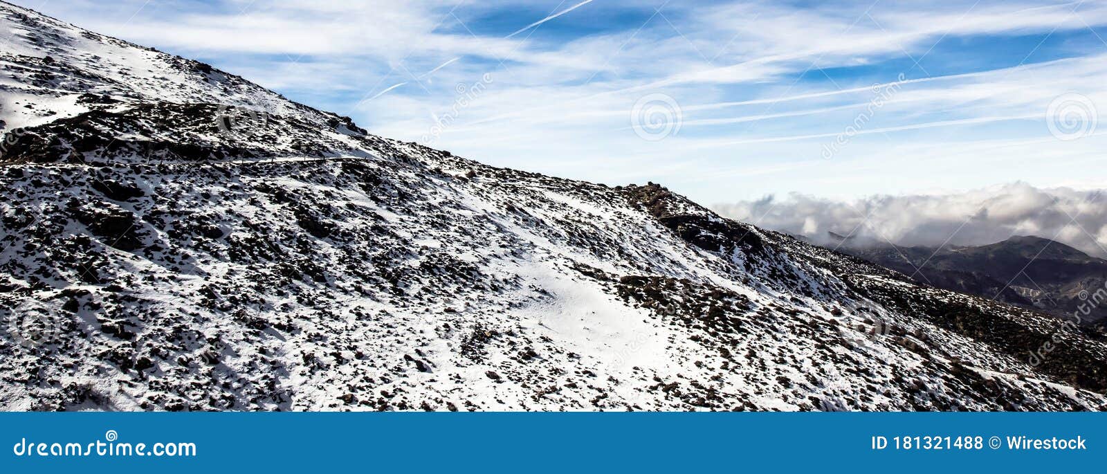 Panoramic Shot of a Hillside Covered with Snow on a Beautiful Landscape ...