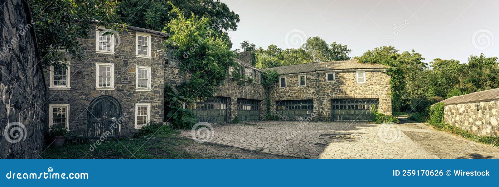 Panoramic Shot of a Stone-walled House on a Sunny Day Stock Photo ...