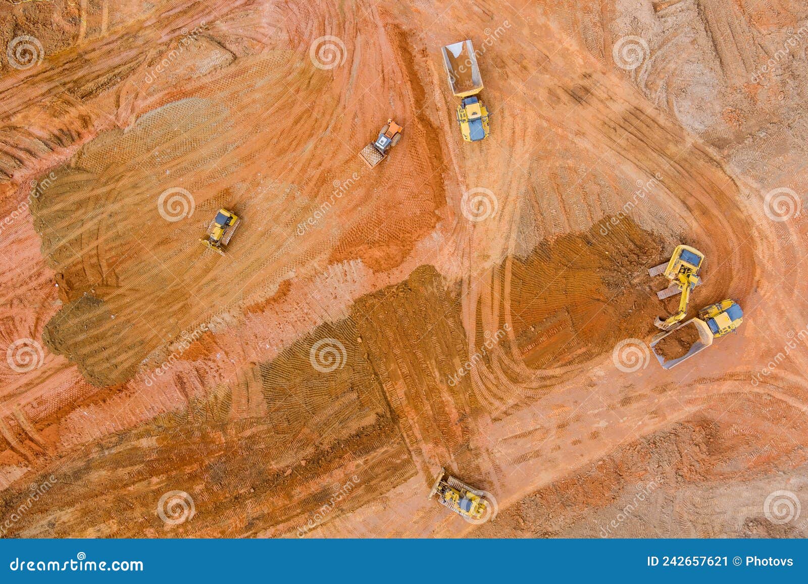 Panoramic Top View of Work Backhoe Digging Soil and Loads a Dump Truck ...