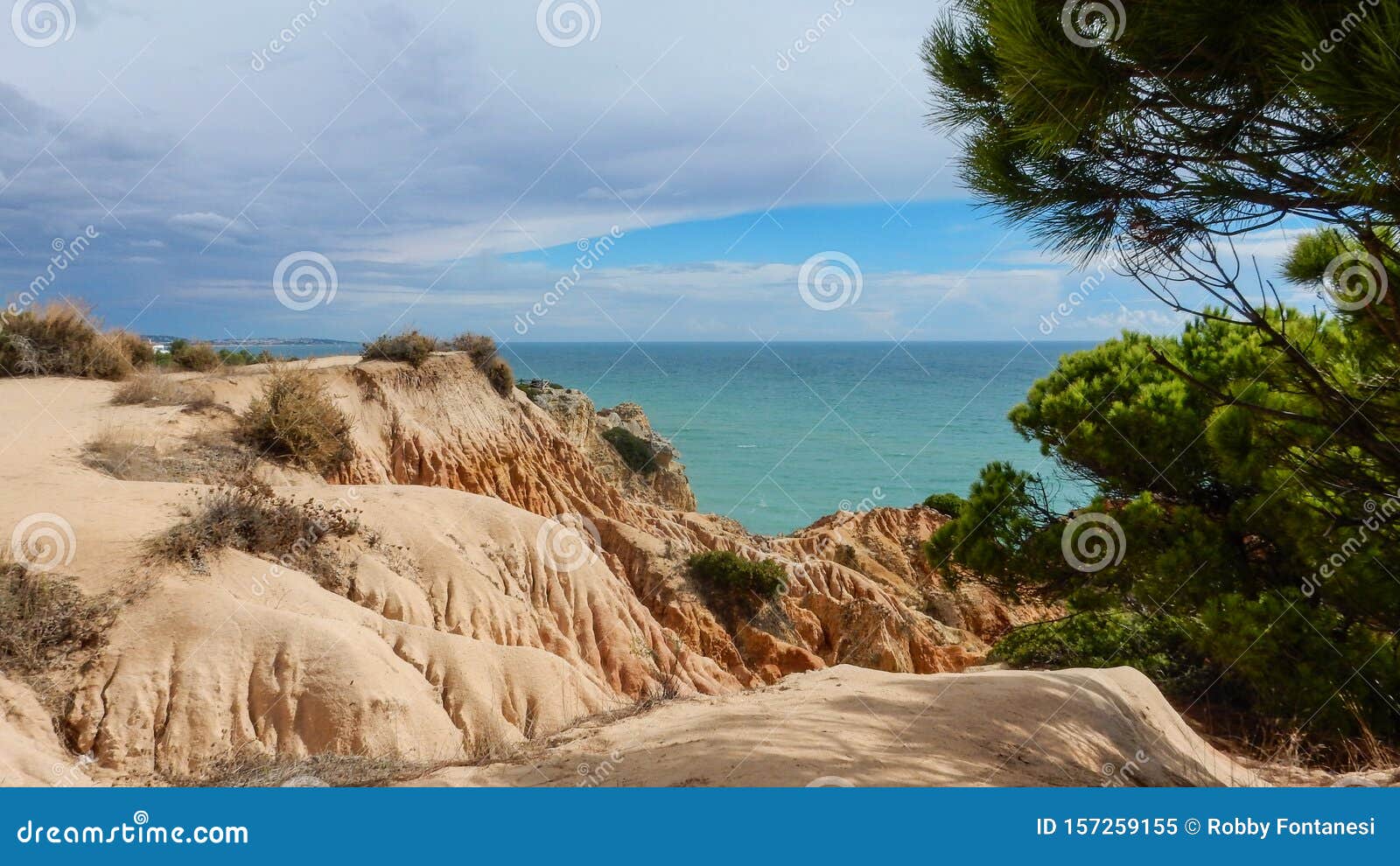 Panoramic View of the Algarve Ocean Cliffs, Portugal, with Cloudy ...
