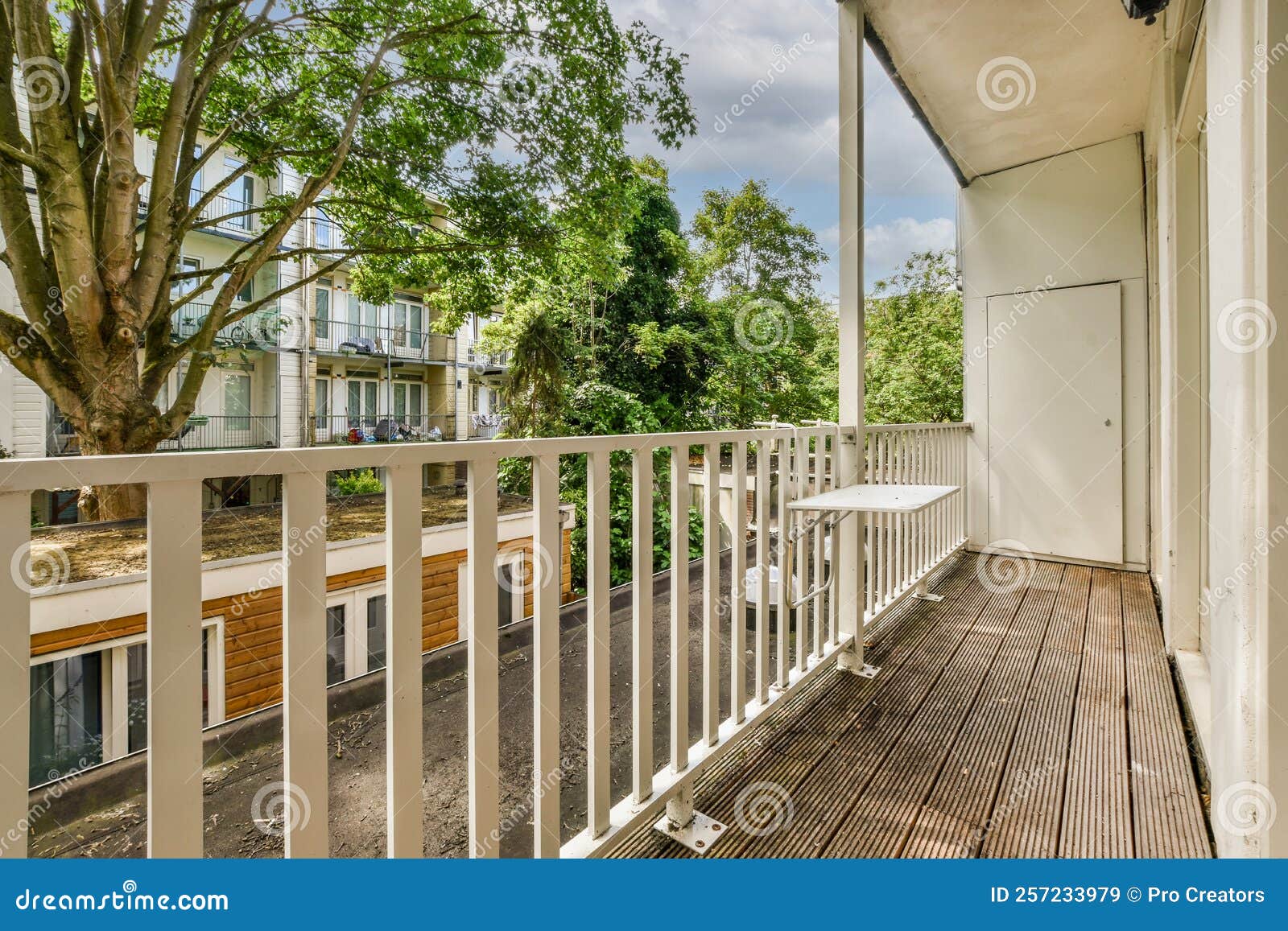 Narrow balcony with door stock image. Image of outdoor - 257233979