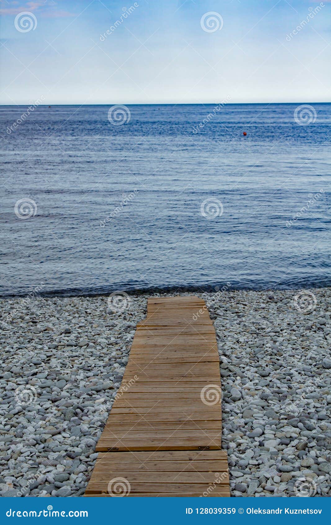 Panoramic View of a Deserted Gravel Beach with Wooden Pathway Stock ...