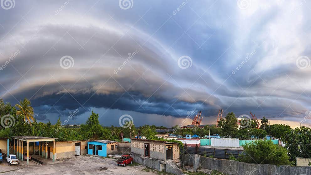 Panoramic View of a Dramatic Storm Cloud Formation Over a Small Town ...