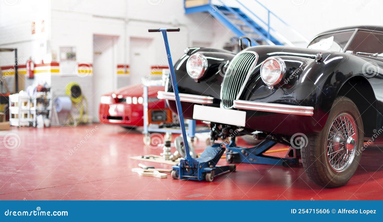 Panoramic View of the Interior of a Garage. Classic Car Being Repaired ...