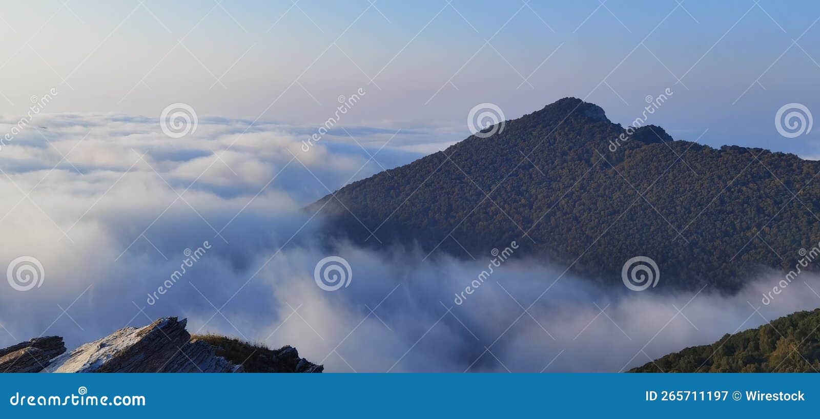Panoramic View of the Mist Covered Mountains and Rocks Stock Image ...
