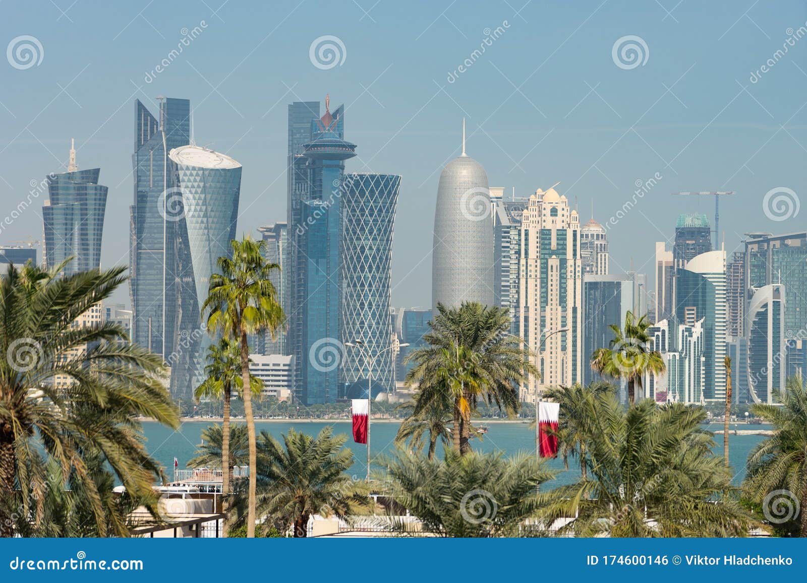 Panoramic View of Modern Skyline of Doha through Blurred Palm Trees ...
