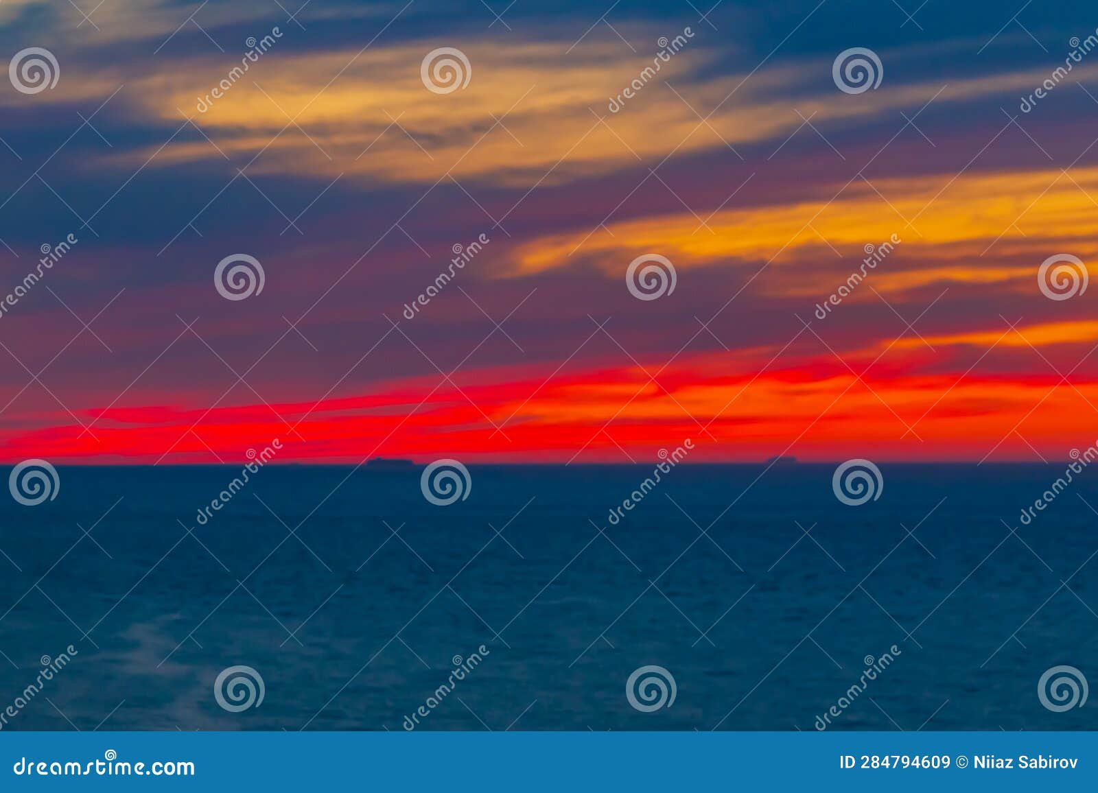 Panoramic View of the Ocean Sunset Against the Background of Multi ...
