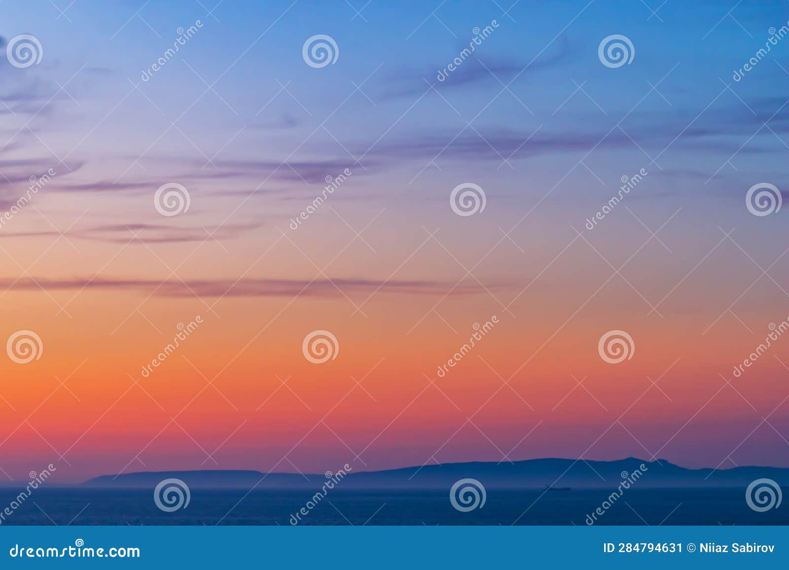 Panoramic View of the Ocean Sunset Against the Background of Multi ...