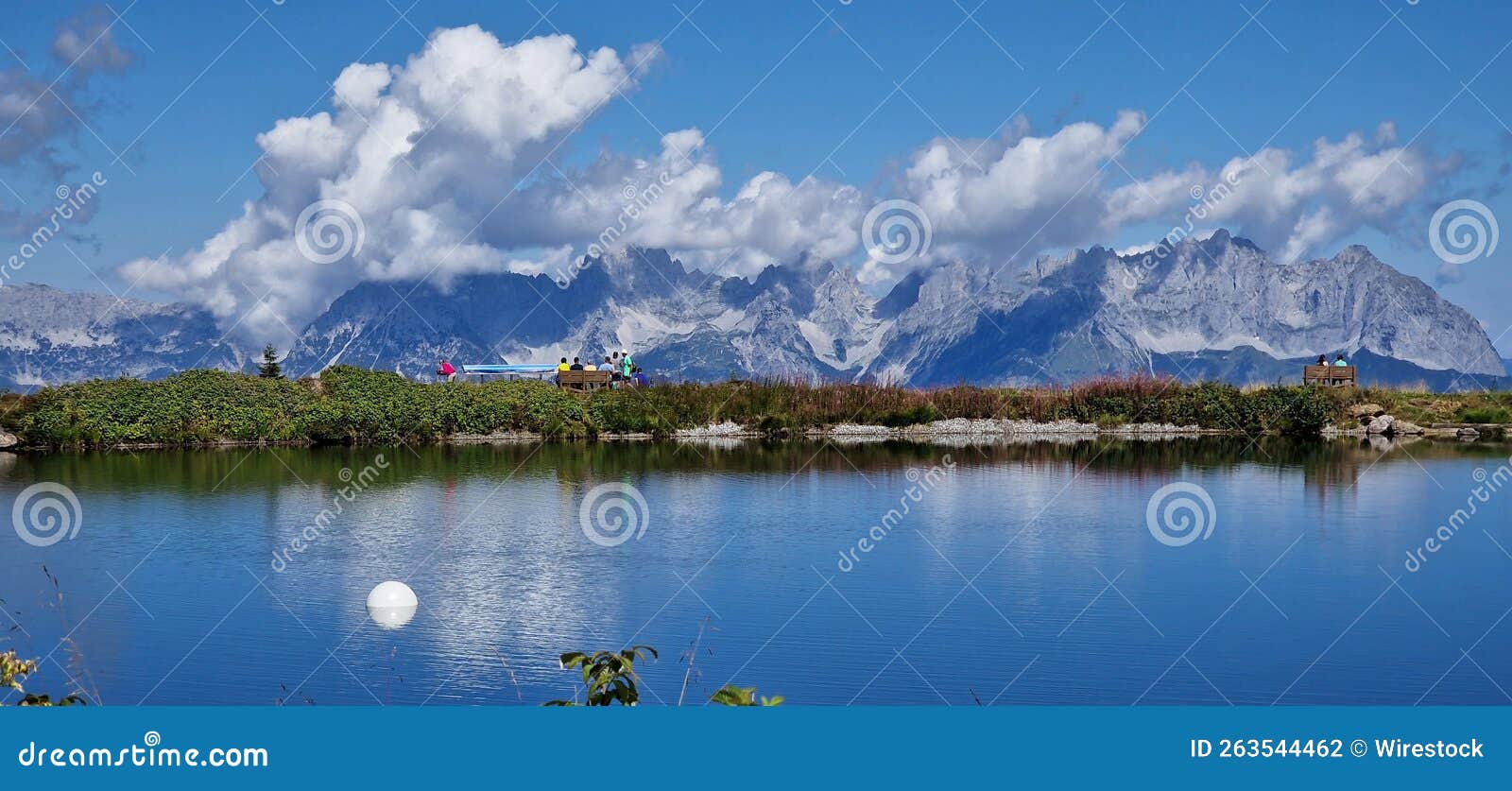 Panoramic View of a Park on the Shore of a Blue Lake with Steep ...