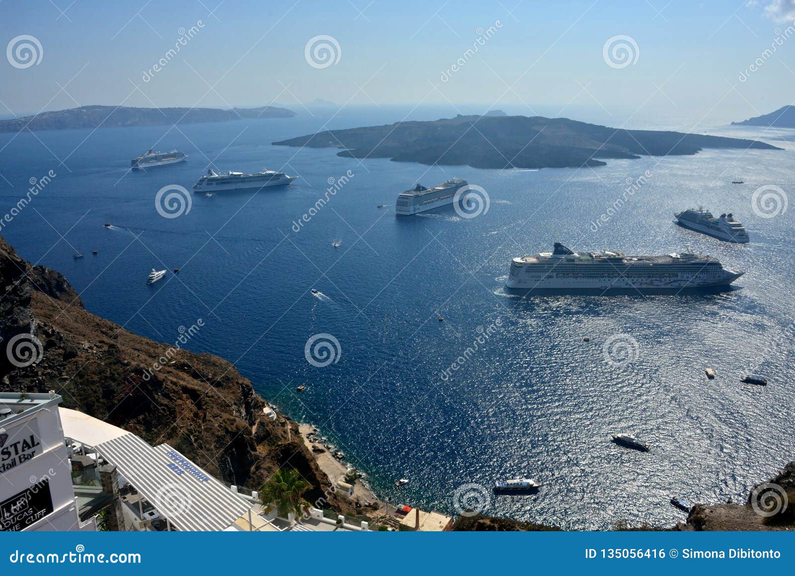 Panoramic View from Santorini of Five Cruise Ships Anchored in Front of ... Panoramic View from Santorini of Five Cruise Ships Anchored in Front of ...
