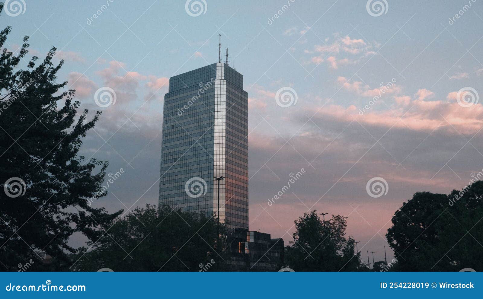 Panoramic View of a Skyscraper with the Purple Sky in the Background ...