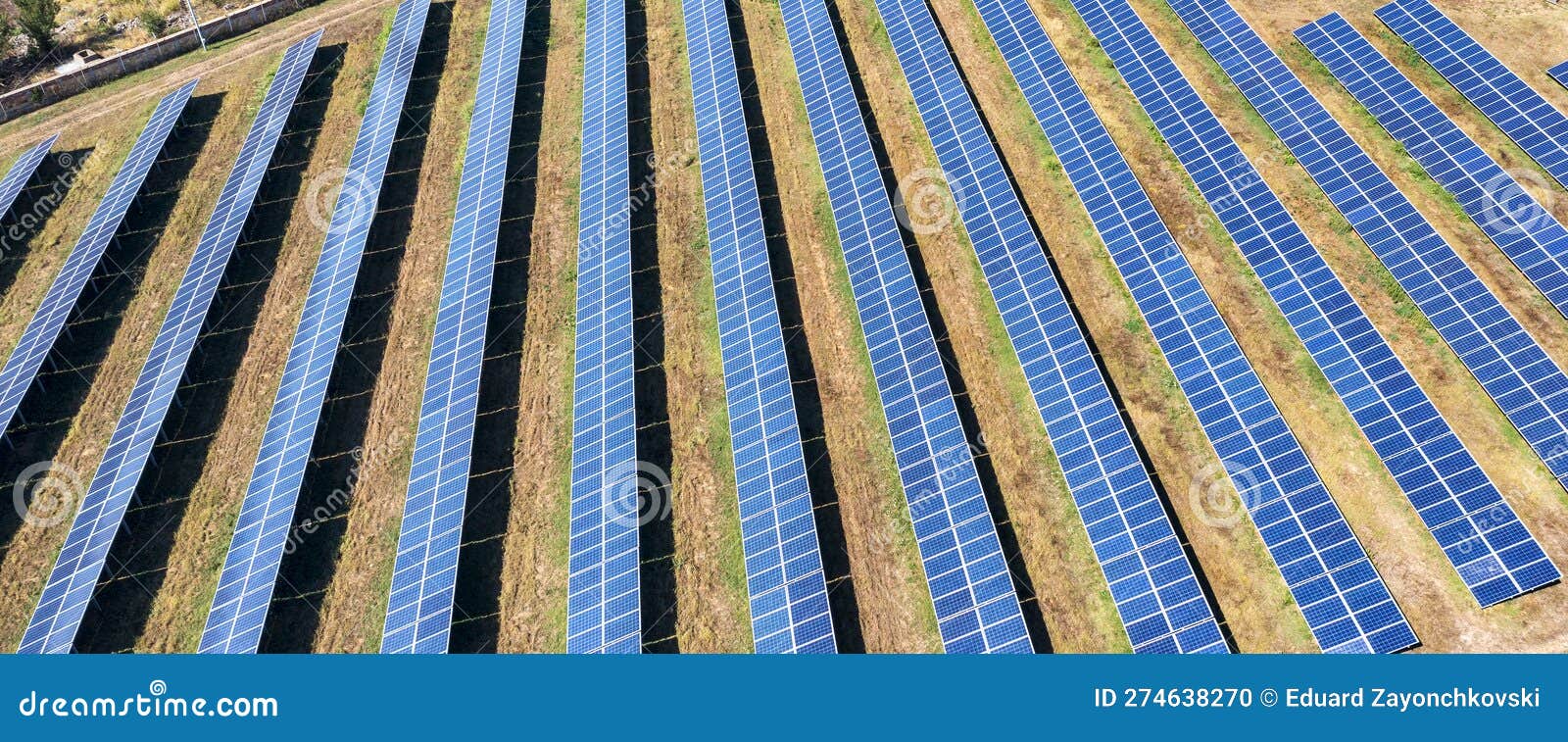 Pano Solar Panels On Gable Roof Of Home Against Mountain And Blue Sky ...