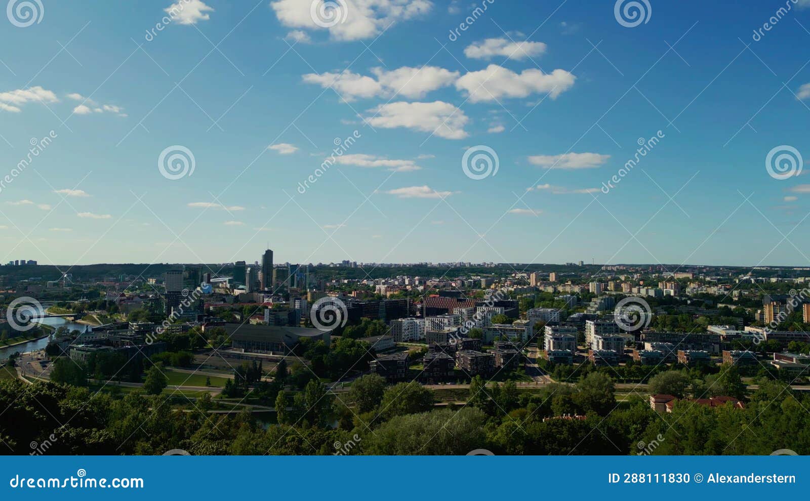 Panoramic View of Vilnius Skyline through the Trees of the Park at ...