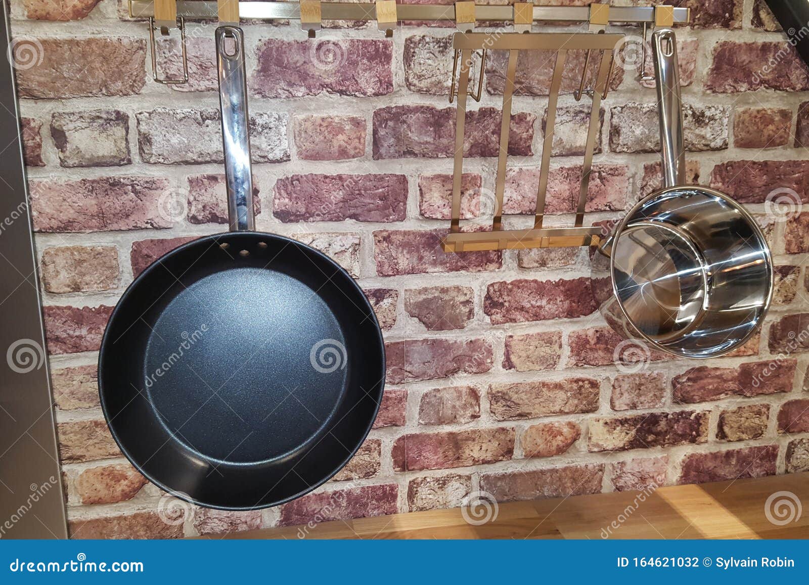 Pans Stove Hung on Brick Wall of Kitchen Stock Photo - Image of fries ...