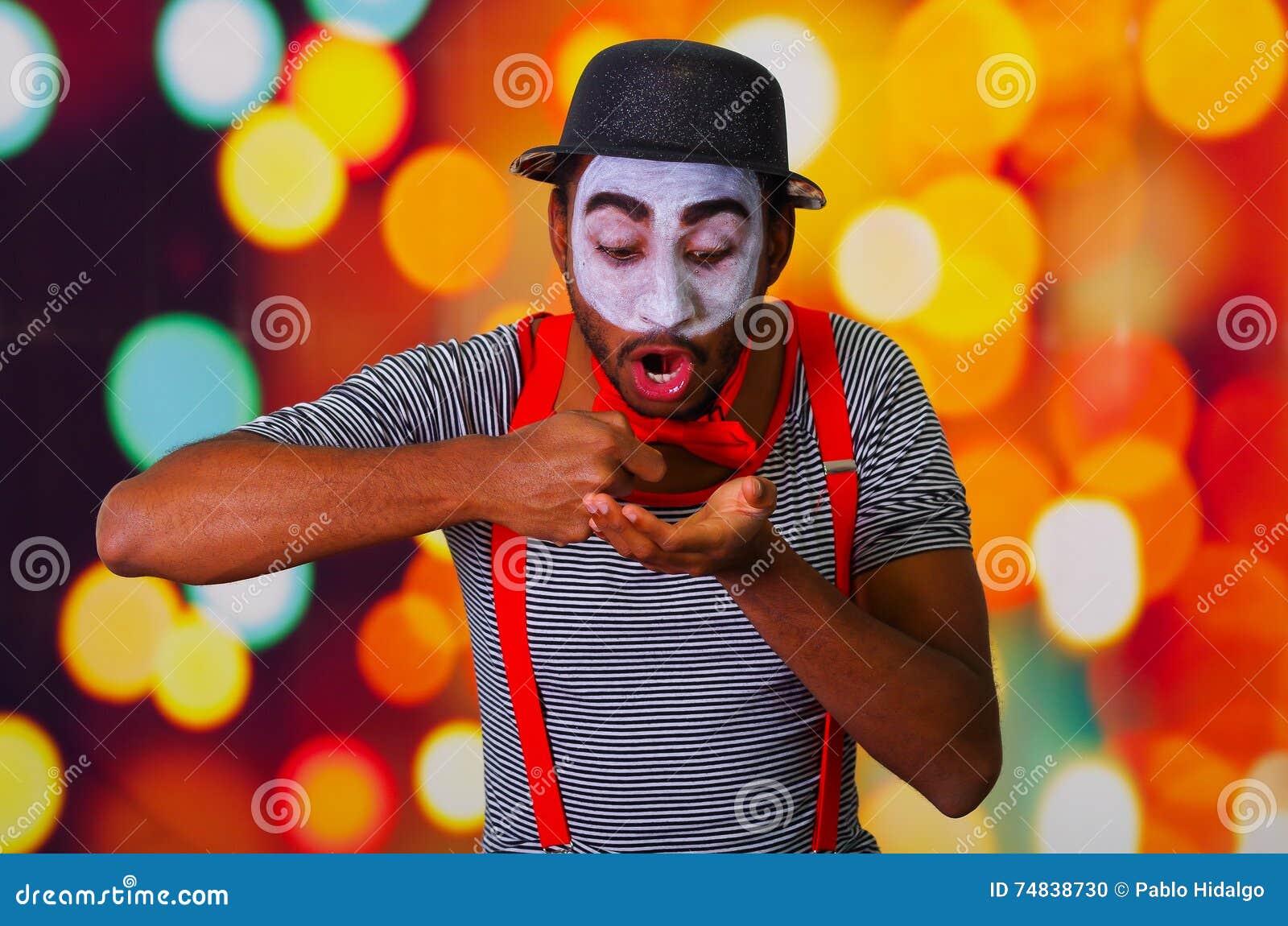 Pantomime Man Wearing Facial Paint Posing for Camera, Using Hands ...