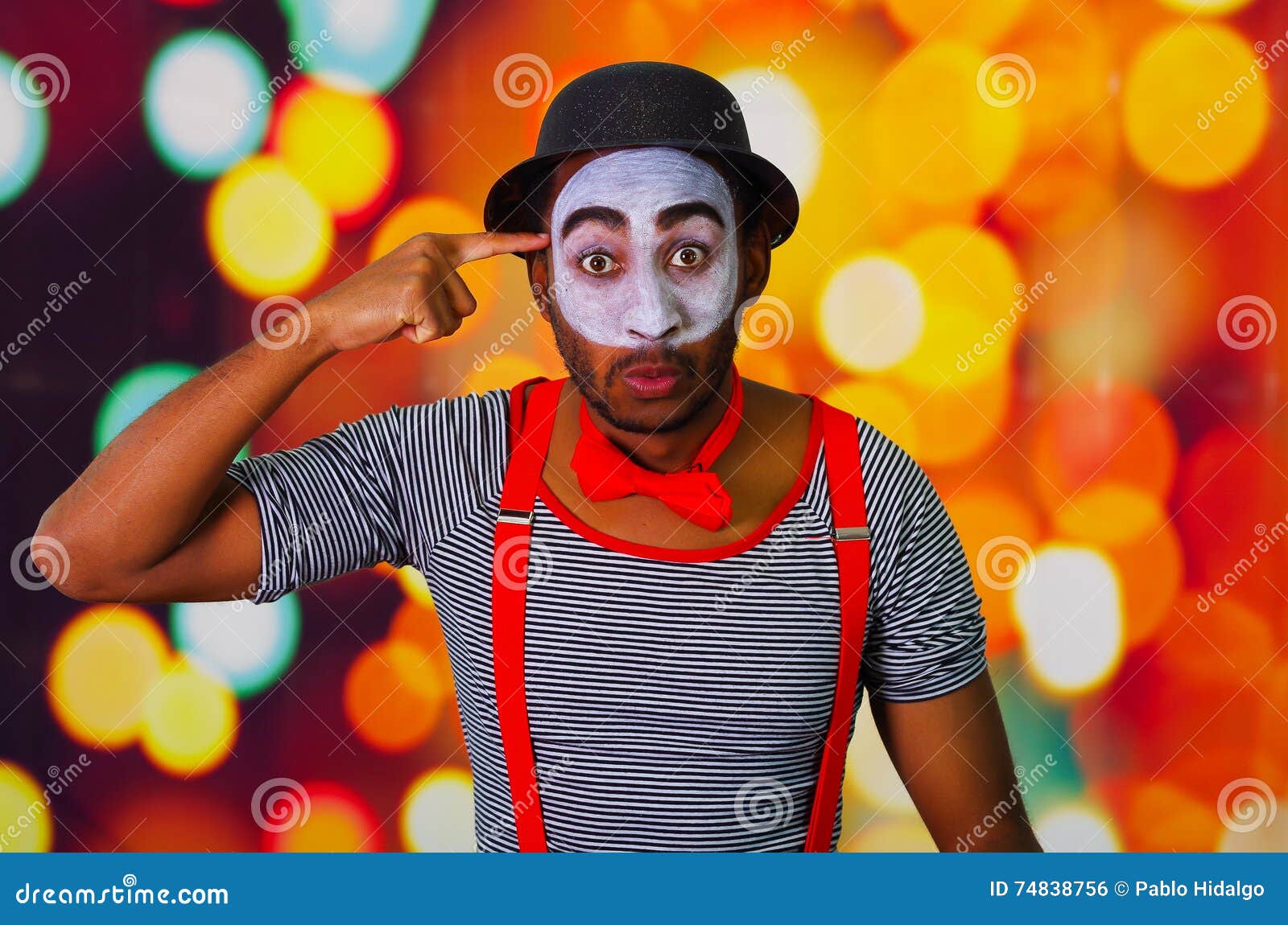 Pantomime Man Wearing Facial Paint Posing for Camera, Using Hands ...