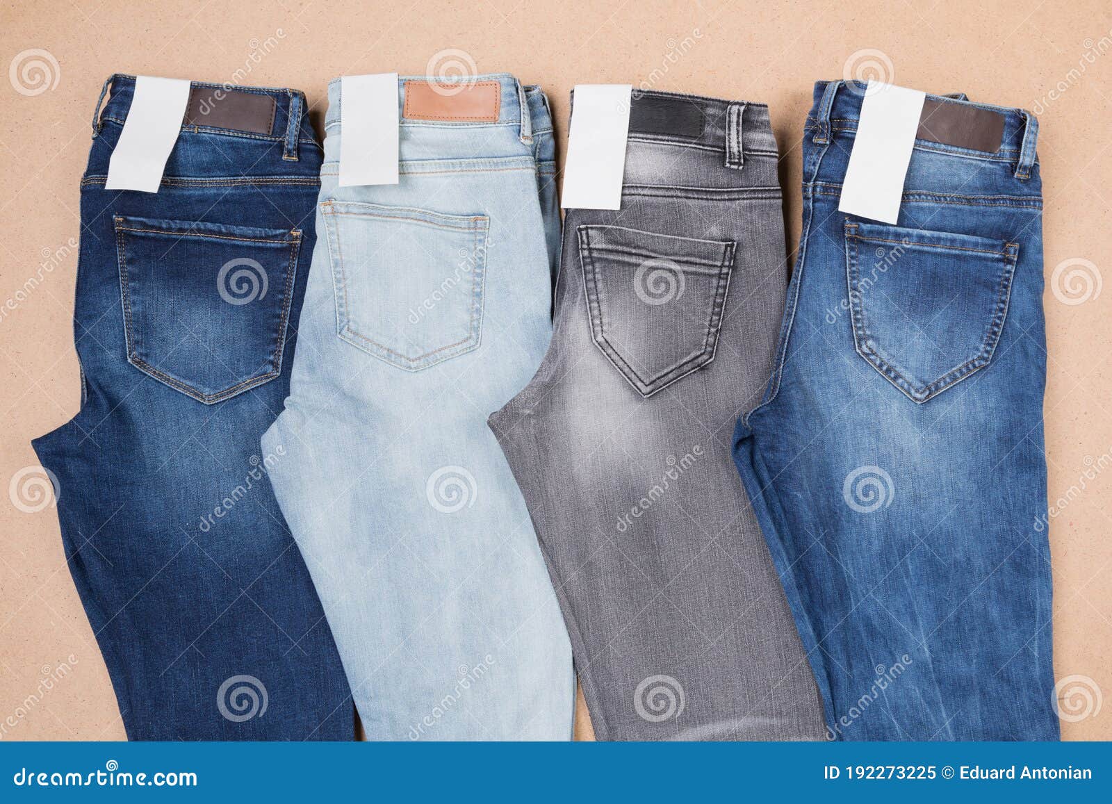 Pants Jeans of Different Colors Lined Up in a Row, Concept Clothes, Top ...
