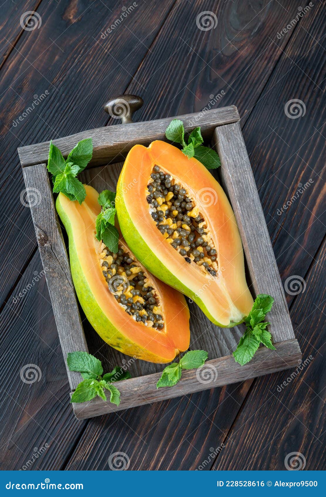 Papaya in the wooden box stock photo. Image of gourmet - 228528616