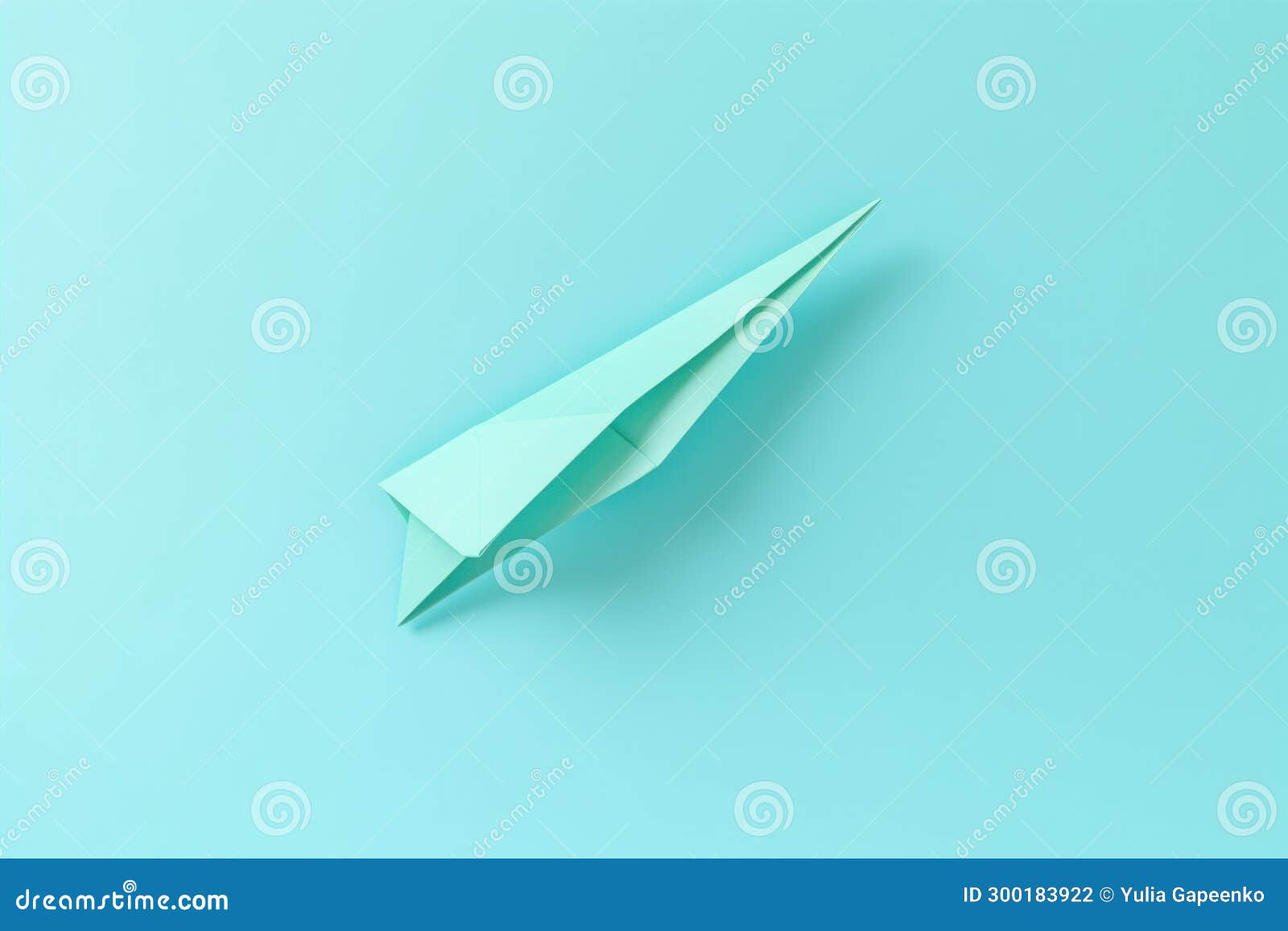 Paper Airplane Isolated on Pale Turquoise Stock Photo - Image of flying ...