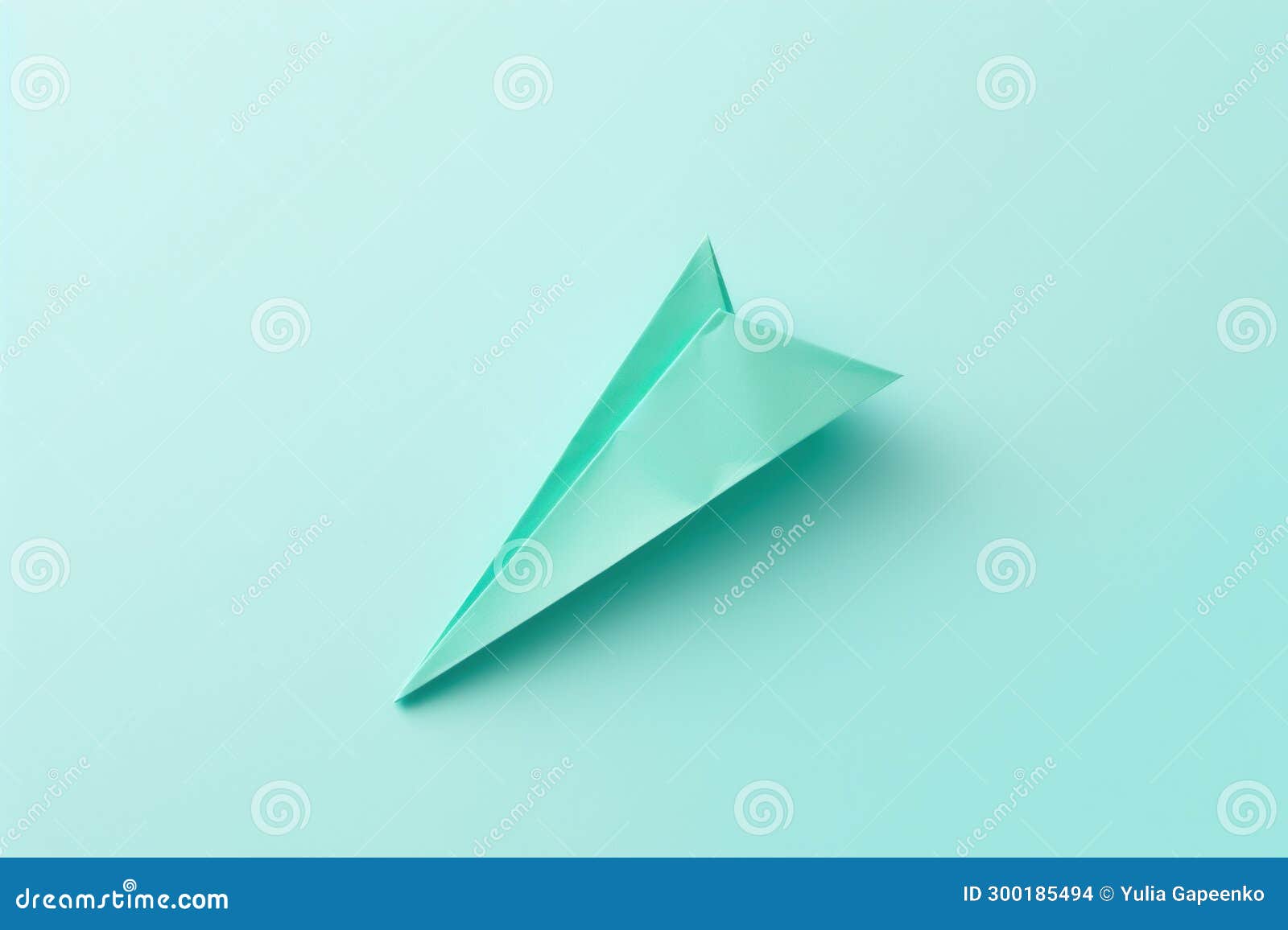 Paper Airplane Isolated on Pale Turquoise Stock Photo - Image of ...