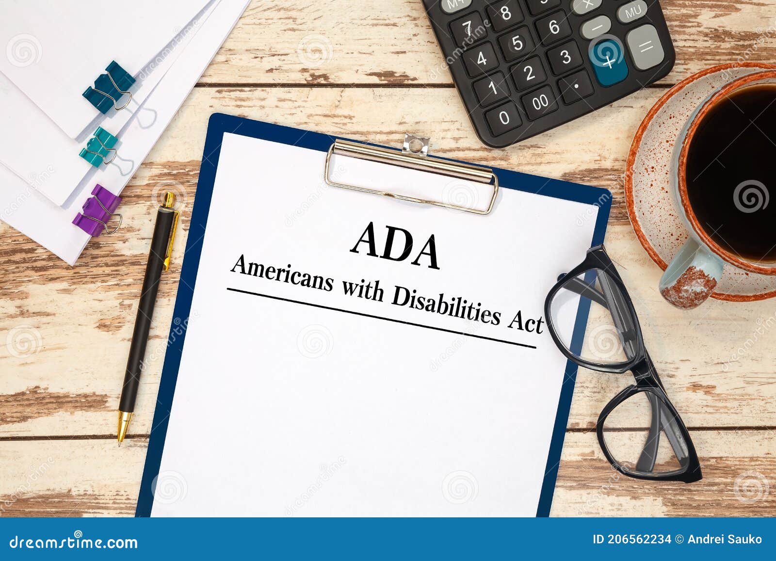 Paper with Americans with Disabilities Act ADA on the Table Stock Photo ...