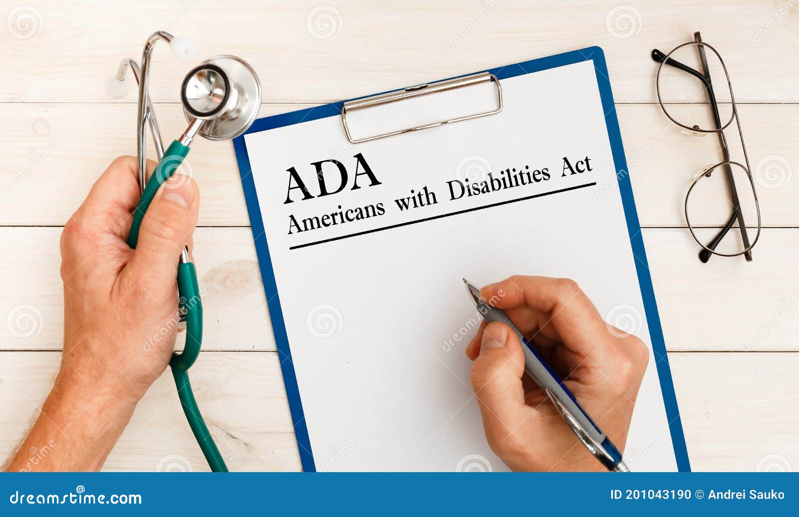 Paper with Americans with Disabilities Act ADA on the Table Stock Photo ...