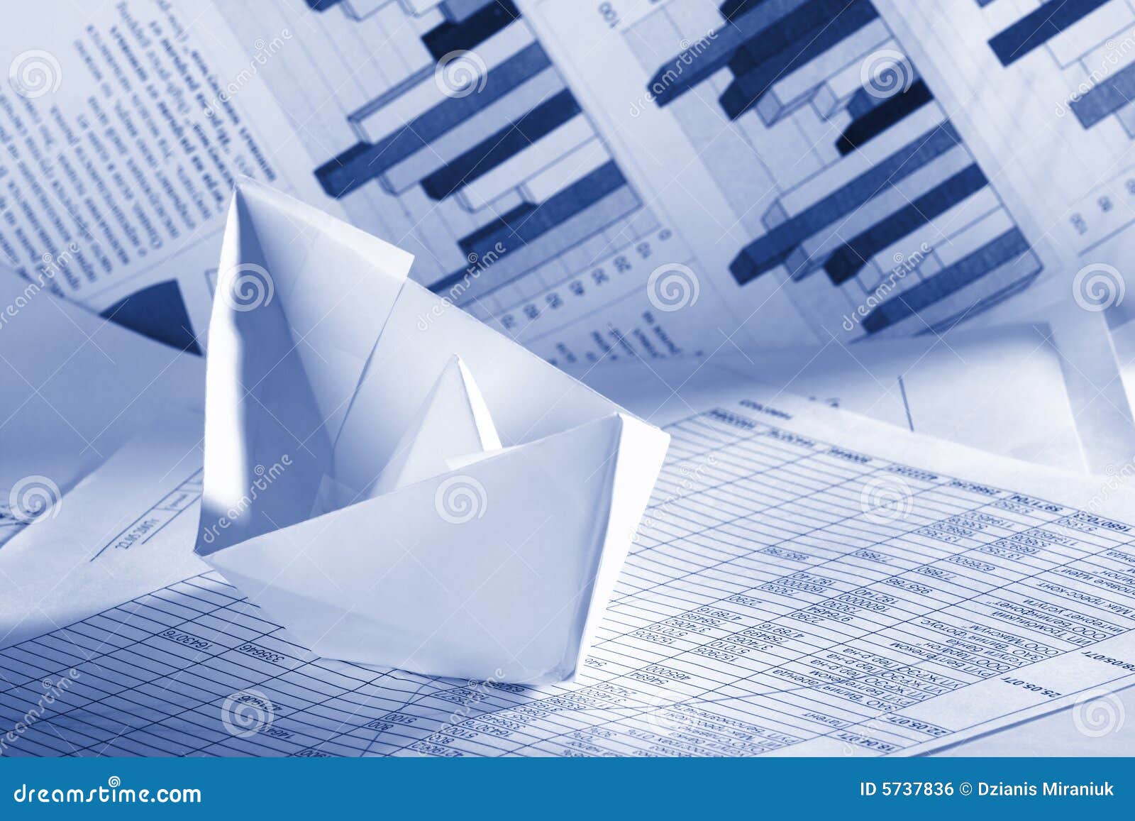 Paper Boat and Bar Graphs stock photo. Image of drift - 5737836