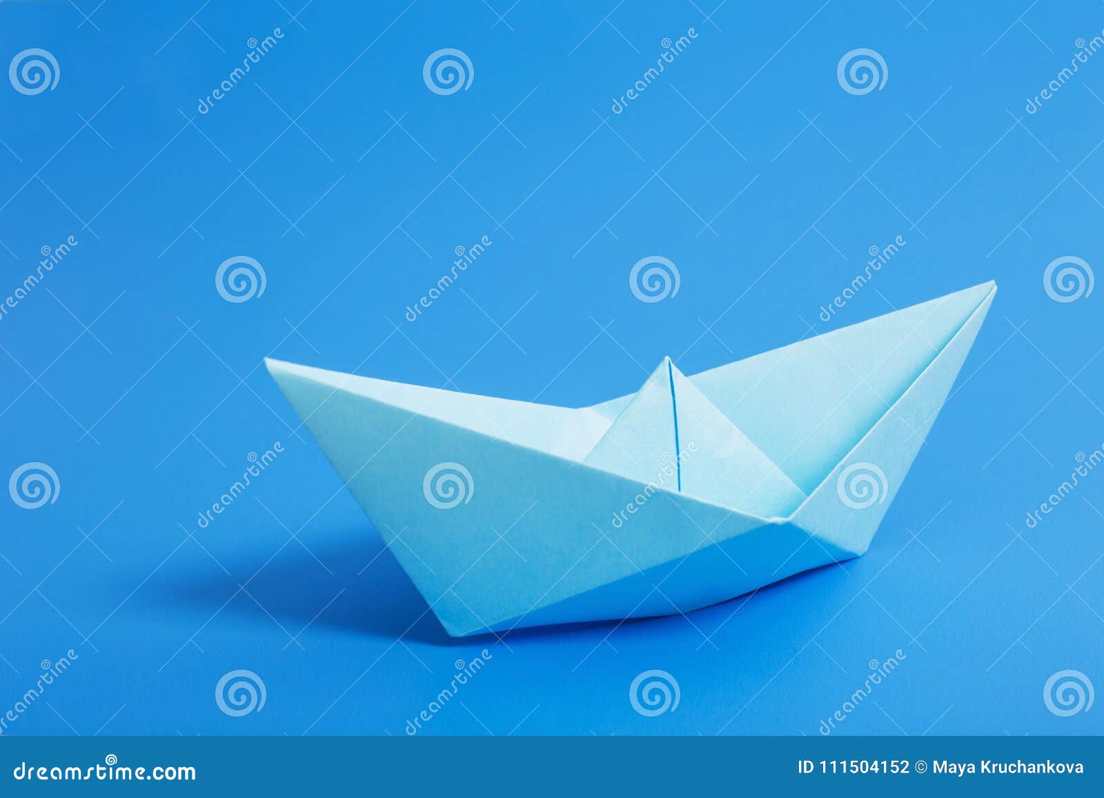Paper Boat on Blue Paper Background Stock Photo - Image of leader, sail ...