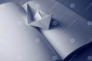 Paper boat on a book stock image. Image of sheet, business - 15743201