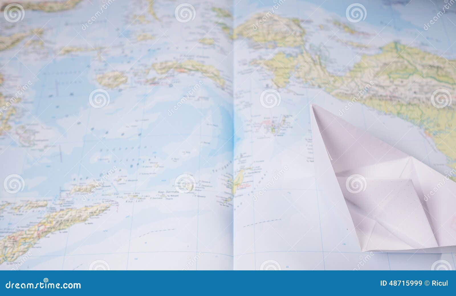 Paper boat on a map stock image. Image of cruise, driving - 48715999