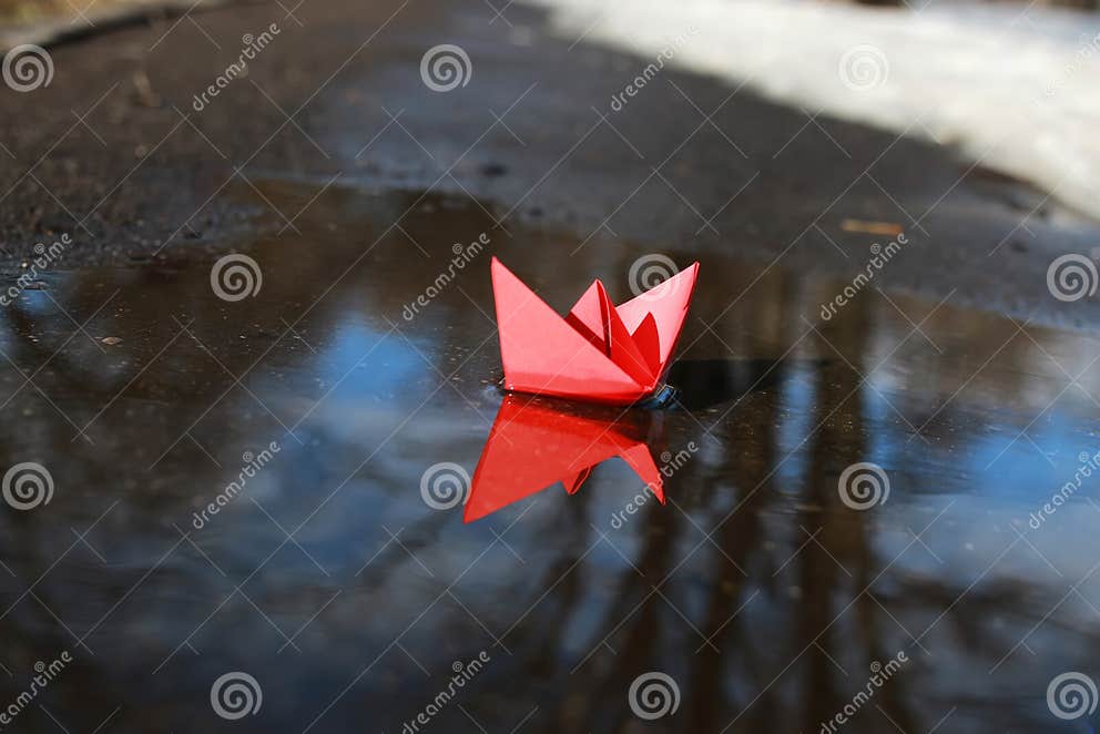 Paper boat in a pool stock photo. Image of entertainment - 79104832