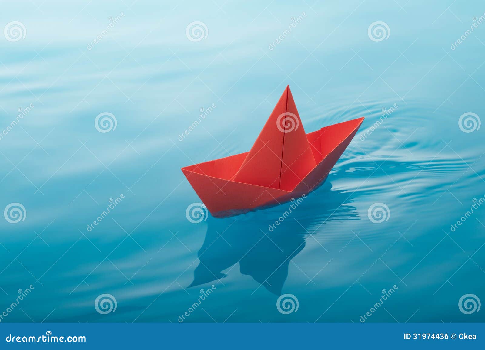 Paper Boat Step By Step Instructions. White Paper On A Blue Background ...