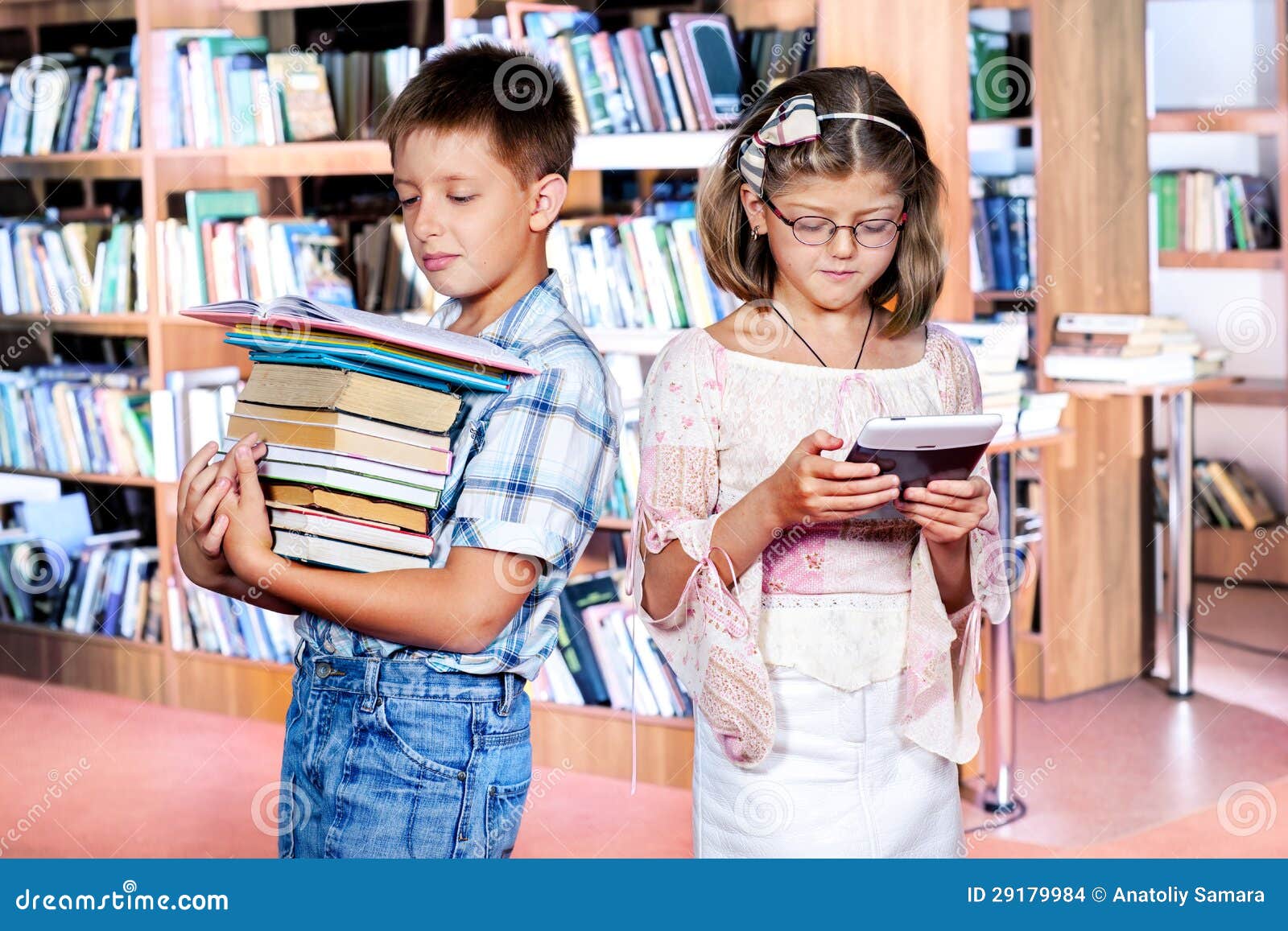 Paper Books Versus E-reader Stock Photo - Image of little, girl: 29179984