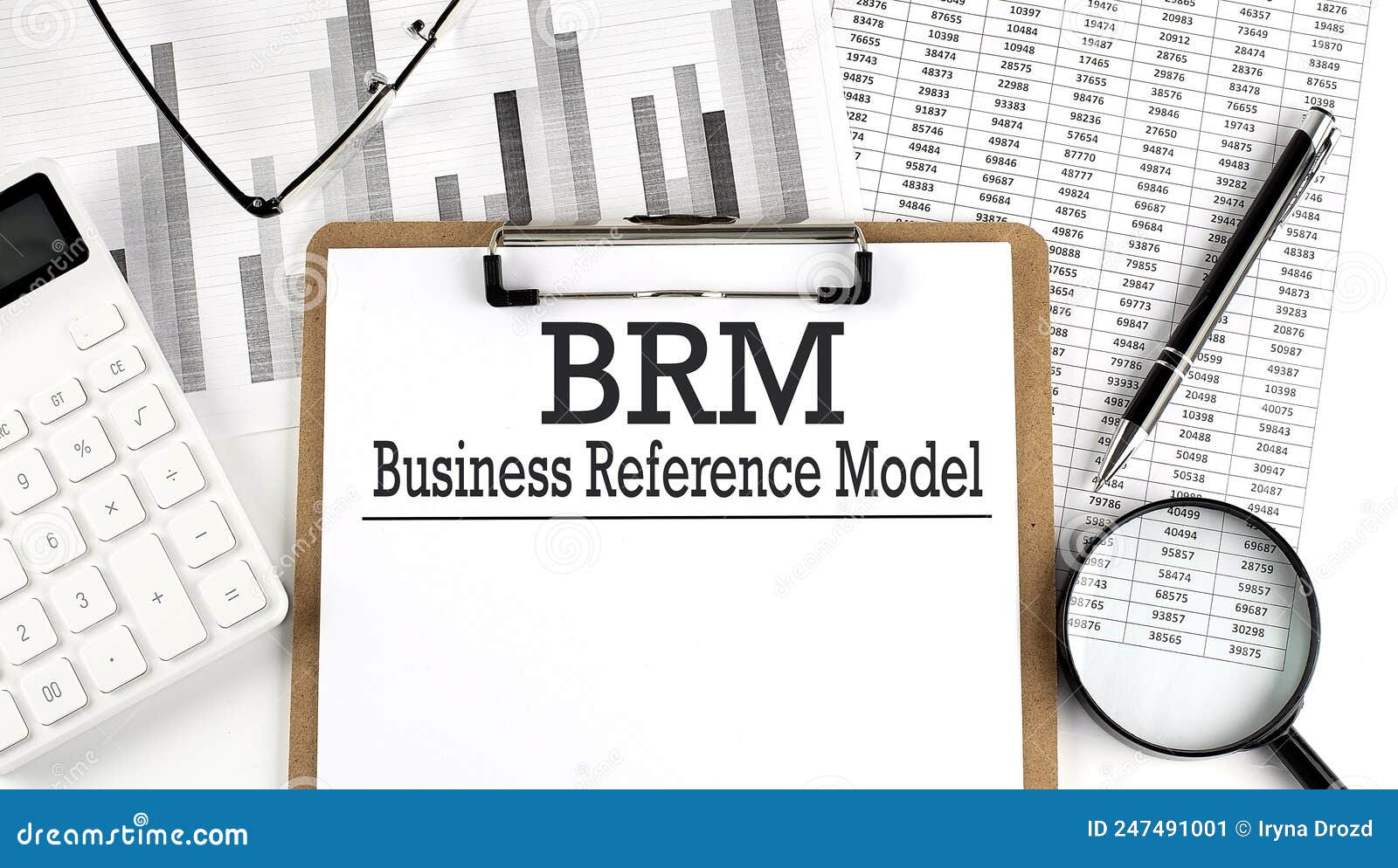 Paper with BRM - Business Reference Model on Table with Charts Stock ...
