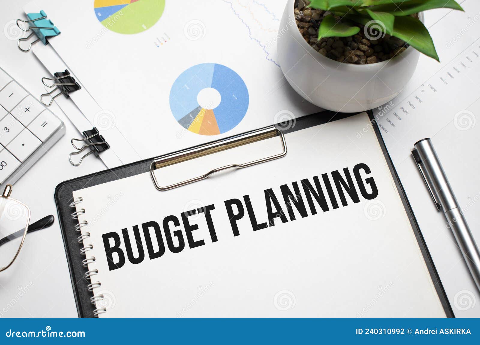 Paper with BUDGET PLANNING on the Table, Calculator and Money Stock ...