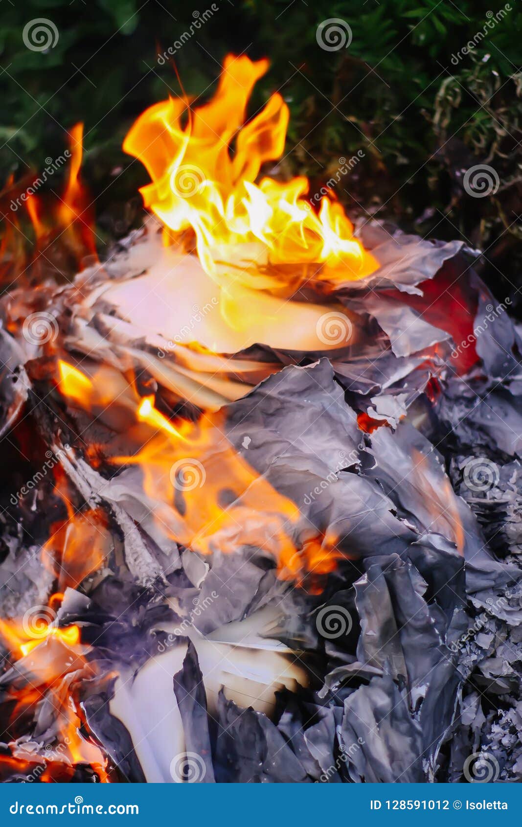 Paper burning outdoors. stock photo. Image of outdoors - 128591012
