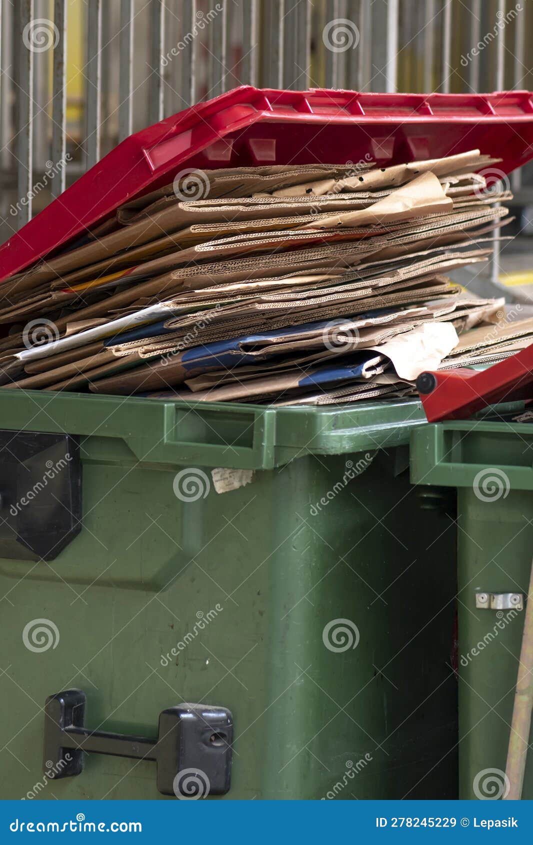 Paper and Cardboard in a Trash Can on the Street. Stock Image - Image ...