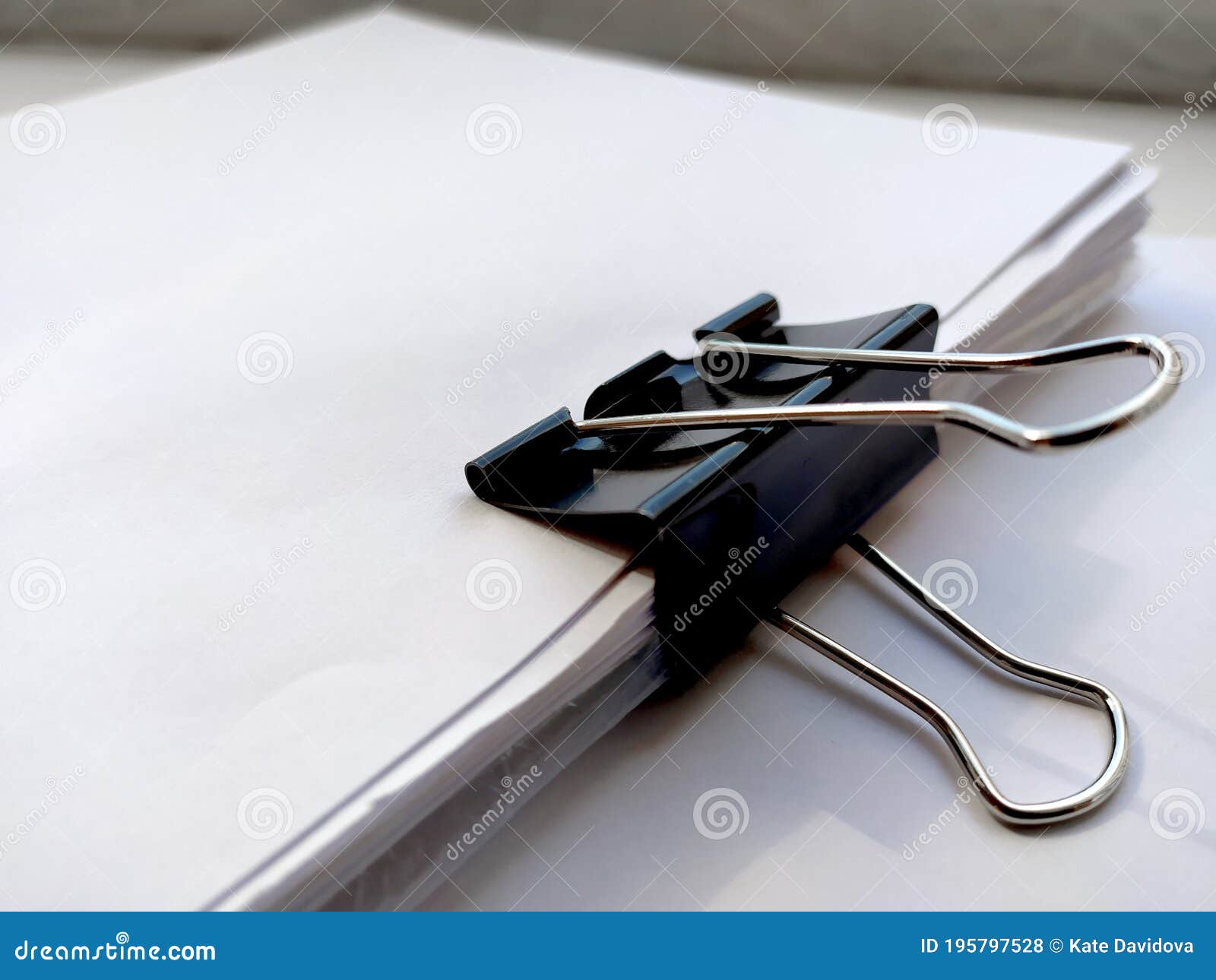 Paper Clamped with a Clerical Binder Stock Photo - Image of theme, clip ...