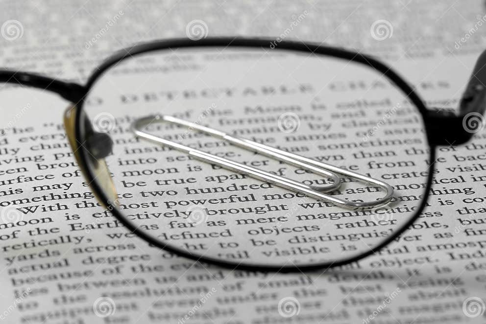Paper clip and glasses stock photo. Image of paperclip - 1460584