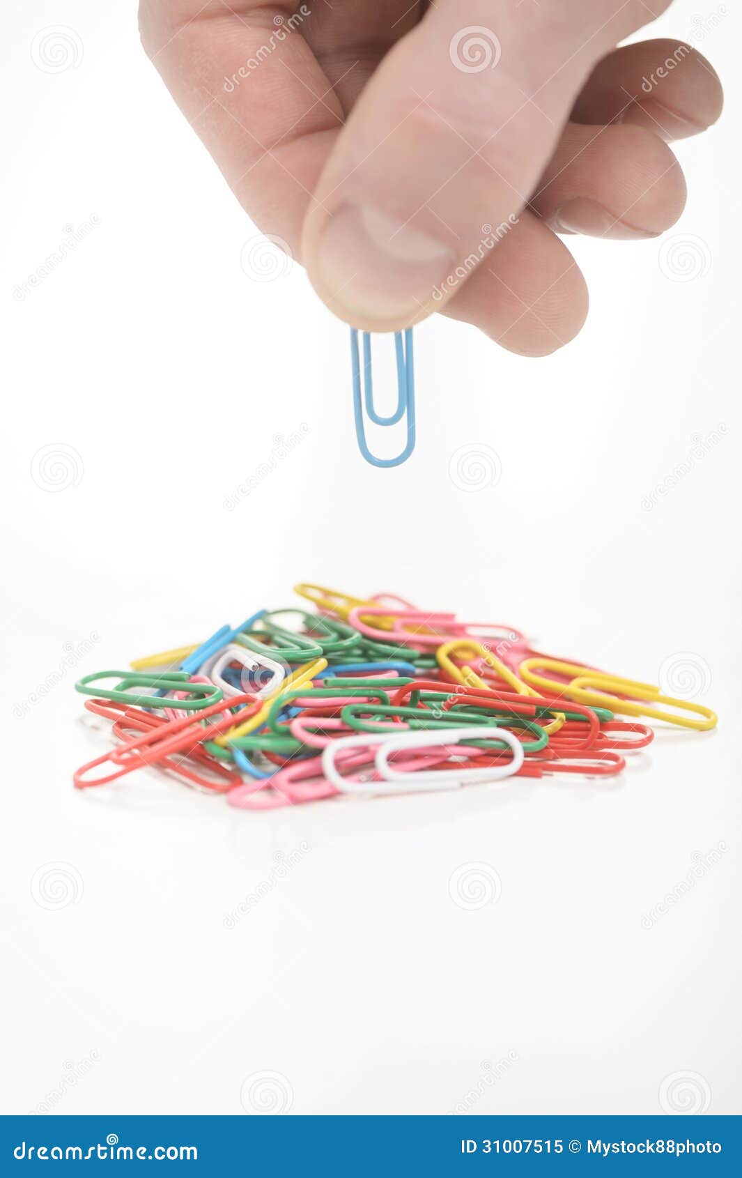 Paper clip in hand stock image. Image of accessory, combined - 31007515