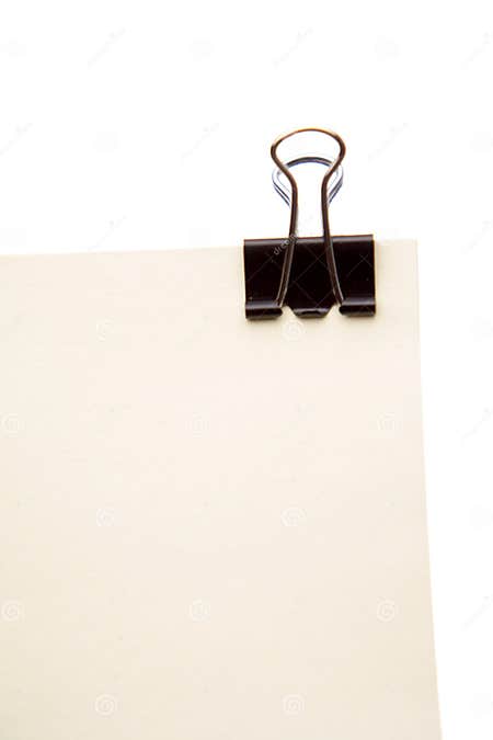 Paper clip holding papers stock photo. Image of object - 10054486