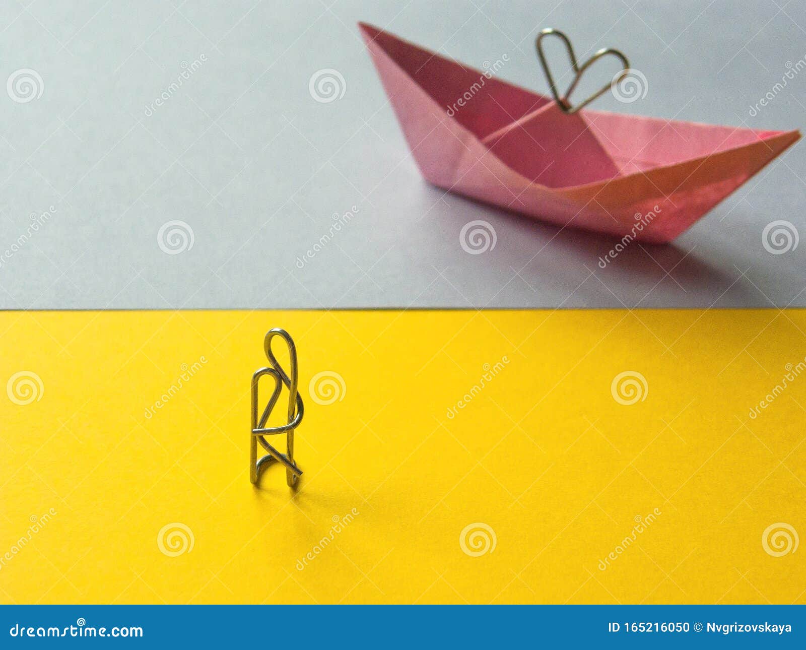 Paper Clip Installation. Lovers Ashore and Paper Boat Stock Photo ...