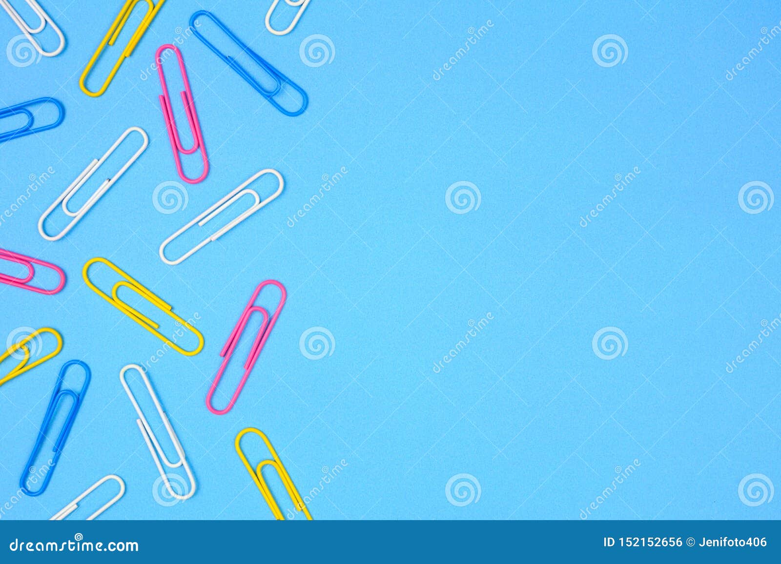 Paper Clip Side Border on a Blue Paper Background with Copy Space Stock ...