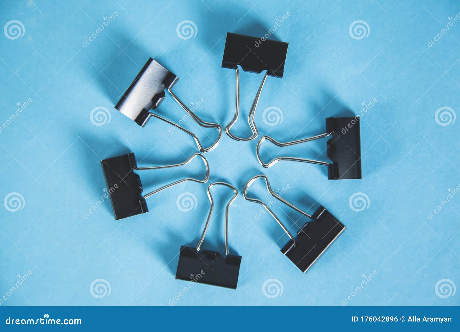 Paper clips on desk stock photo. Image of paperclip - 176042896