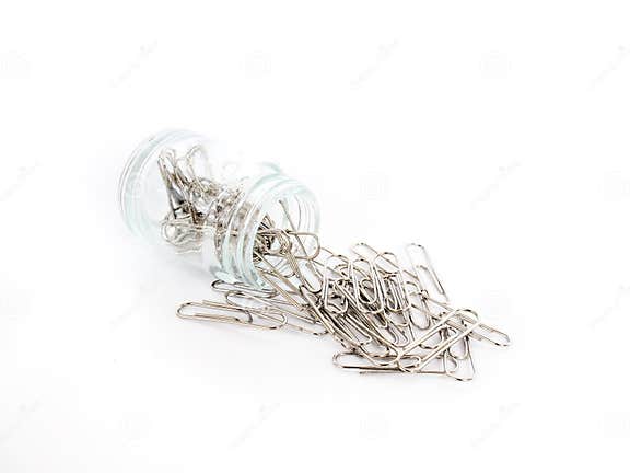 Paper clips and glass jar stock photo. Image of work - 49415536