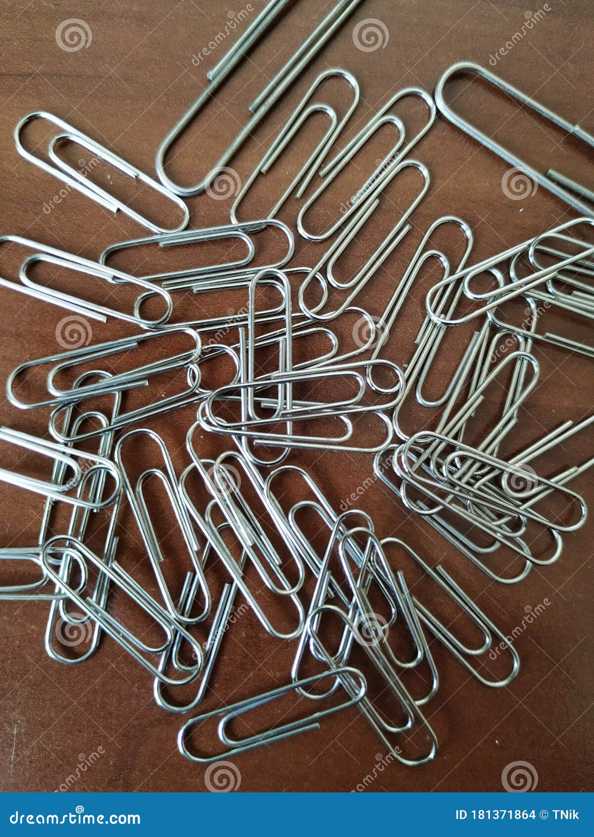 Paper clips on the table stock photo. Image of table - 181371864